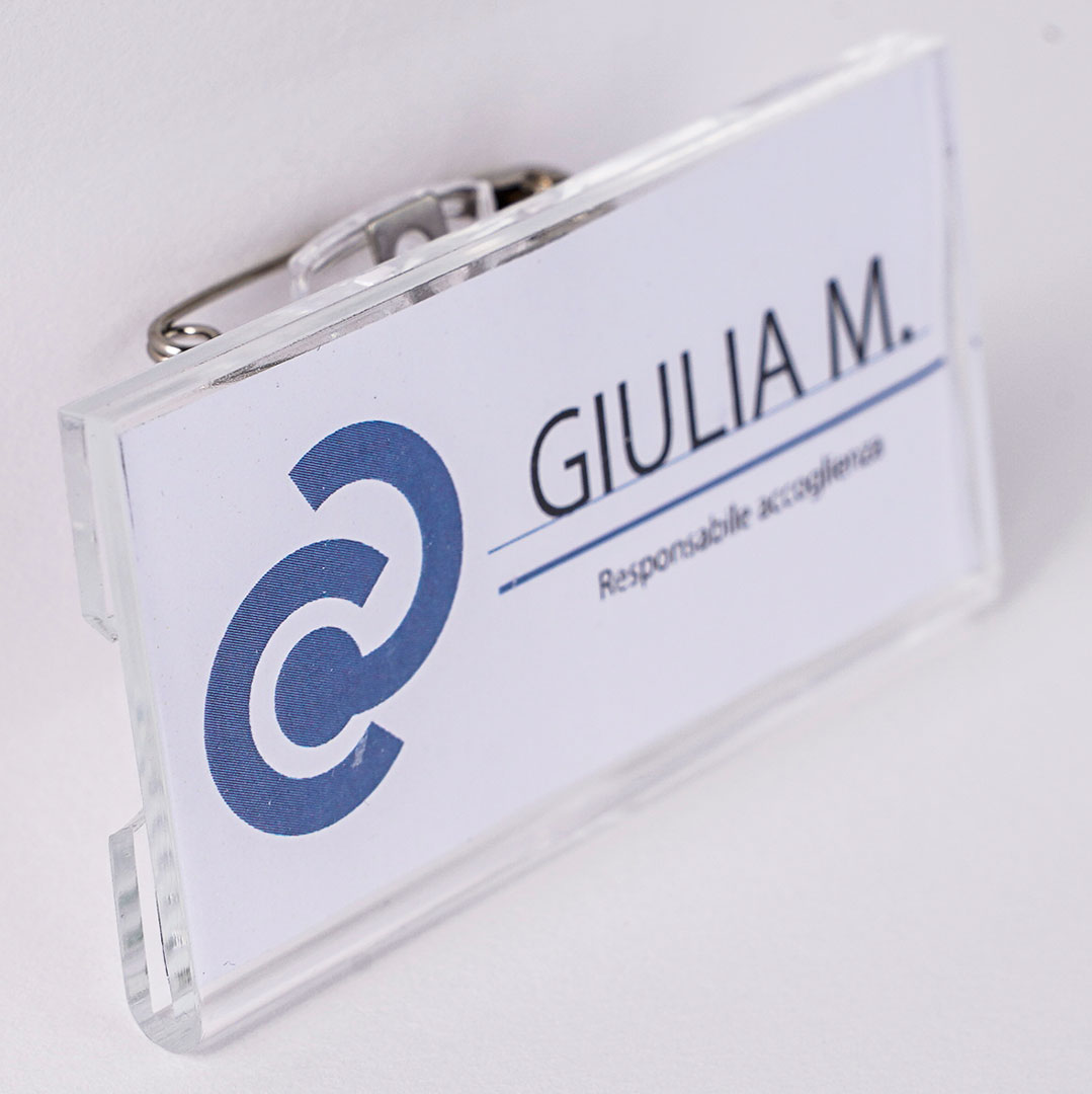 Porta badge piatto in plexiglass, aggancio a molla 65x35 mm
